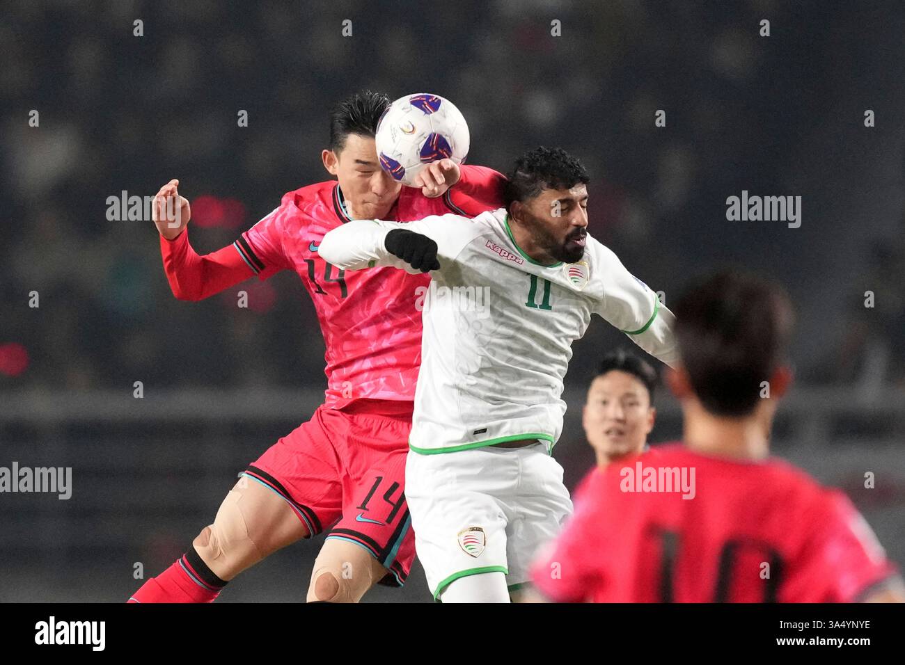 South Korea's Cho Yu-min, left, and Oman's Muhsen Salih Al Ghassani ...