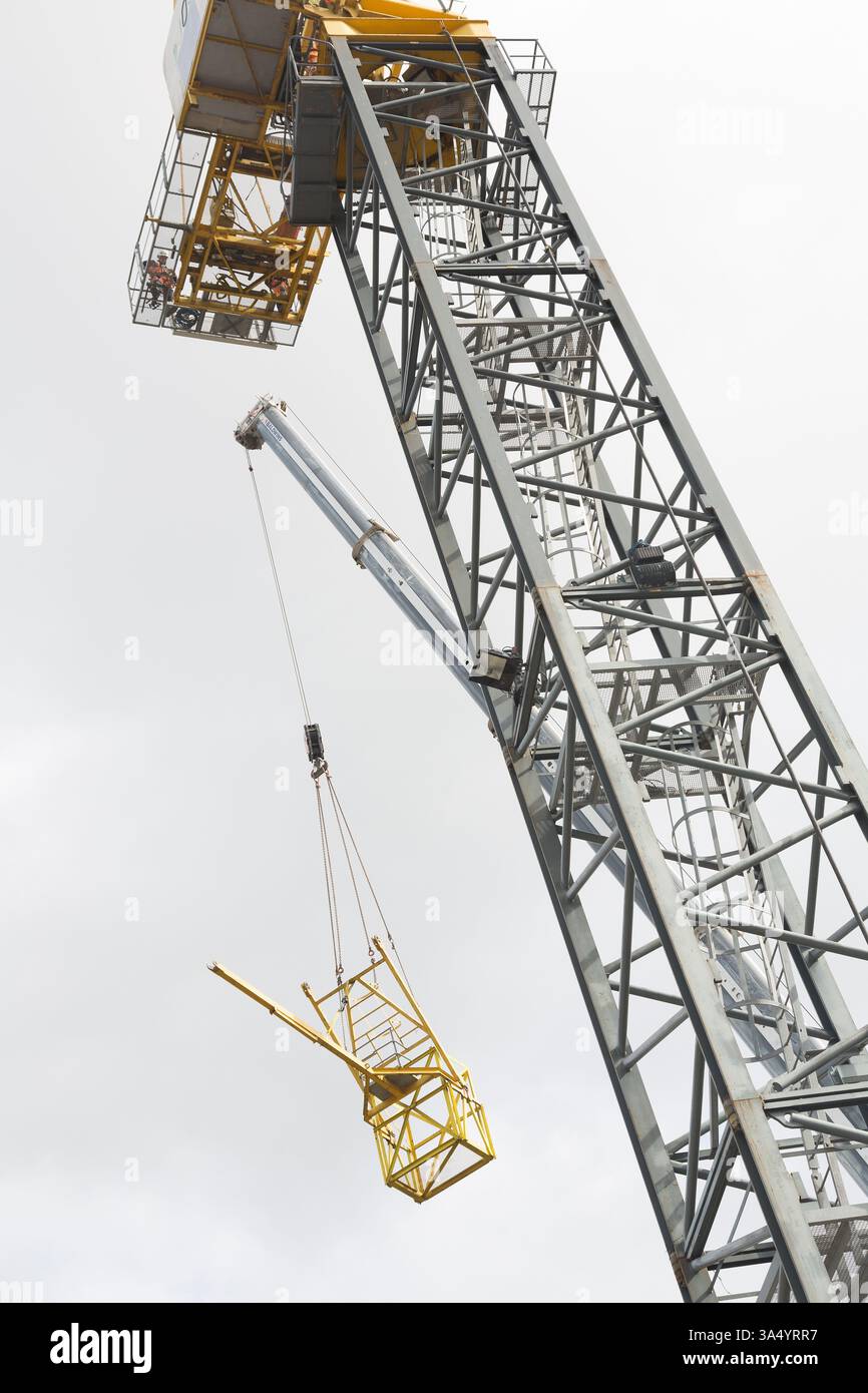 Dismantling a tower crane on a construction site Stock Photo - Alamy