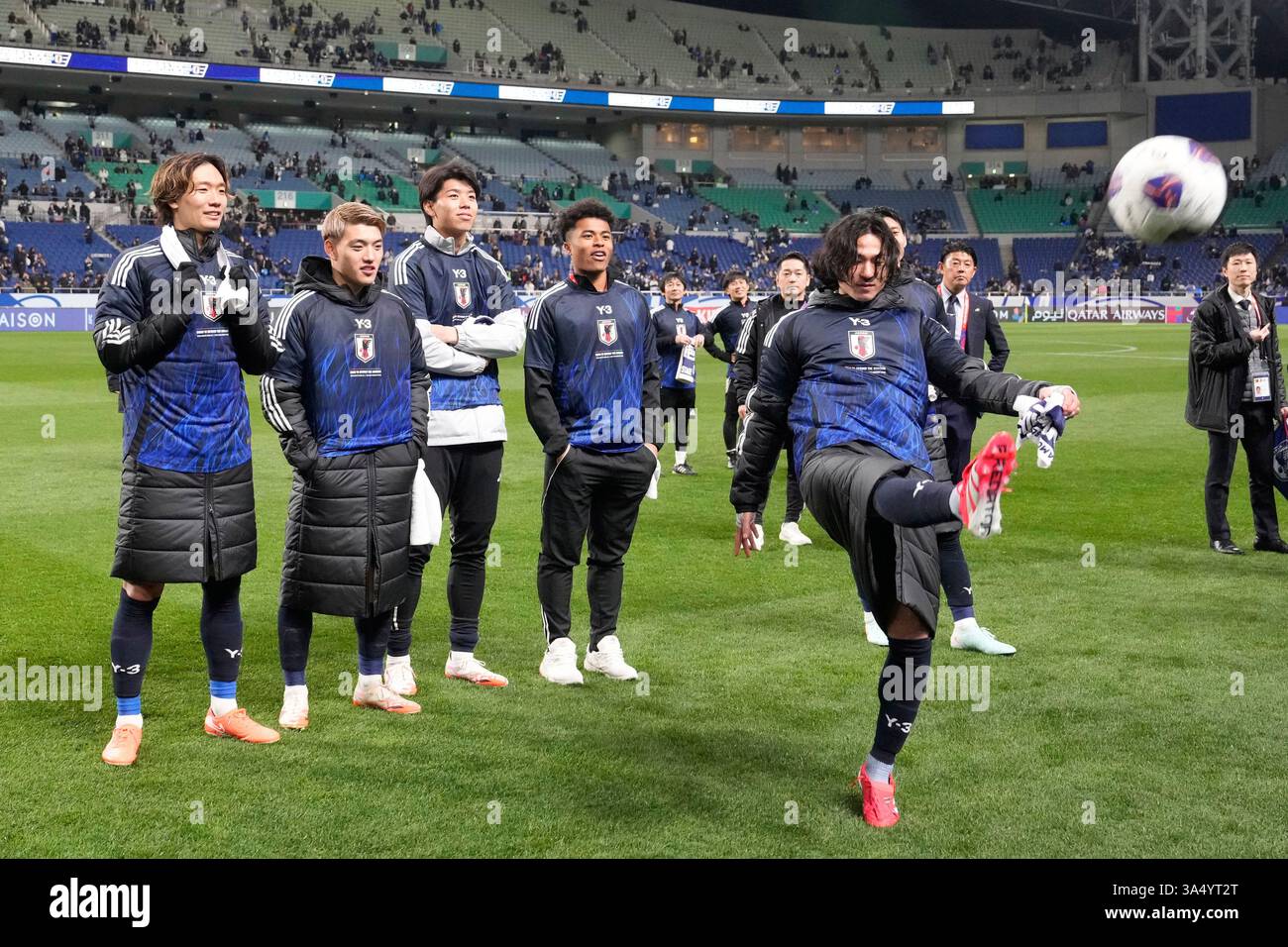 Japanese players celebrate after their win against Bahrain in the World ...