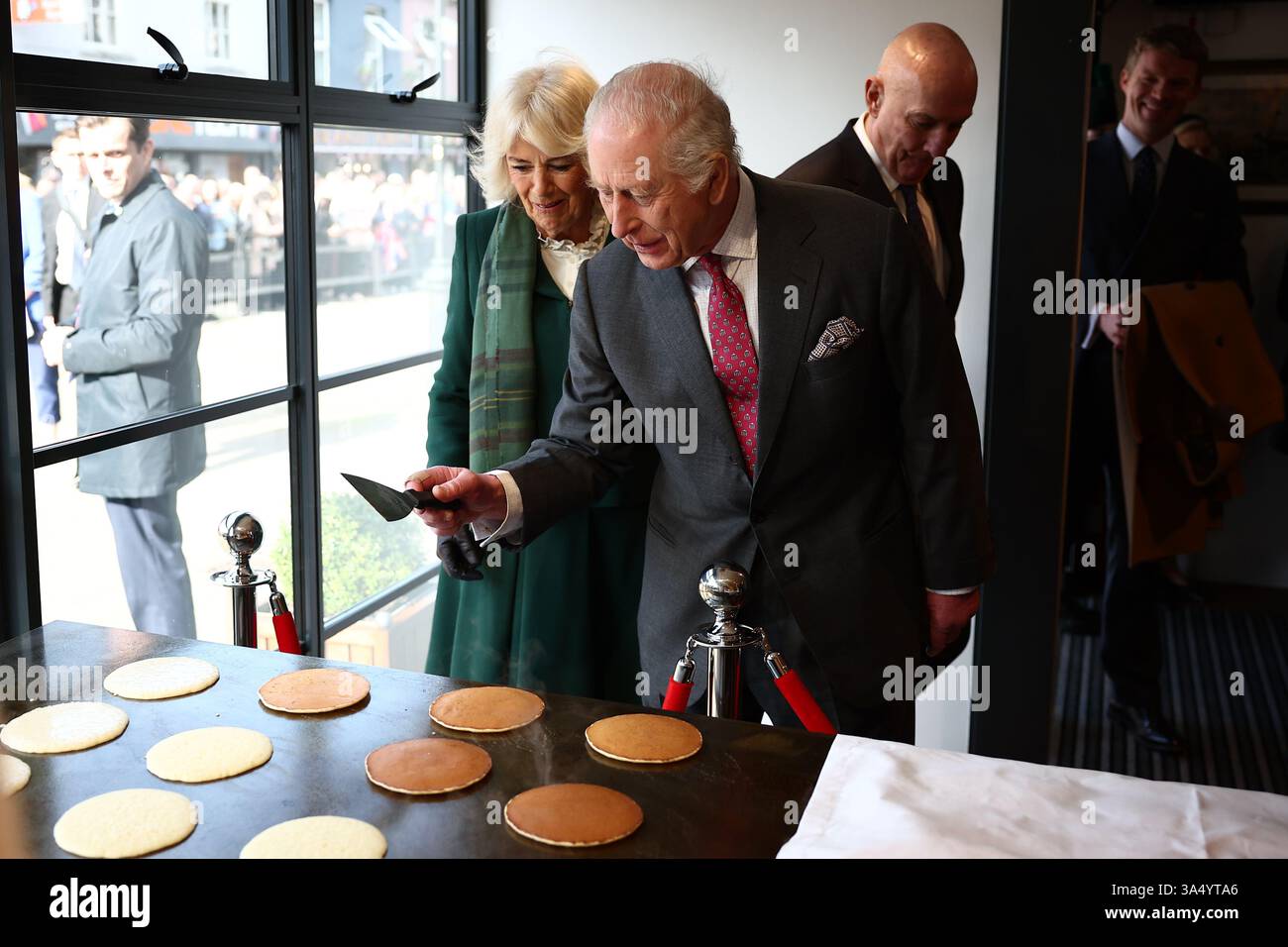 King Charles III and Queen Camilla see a demonstration of the ...