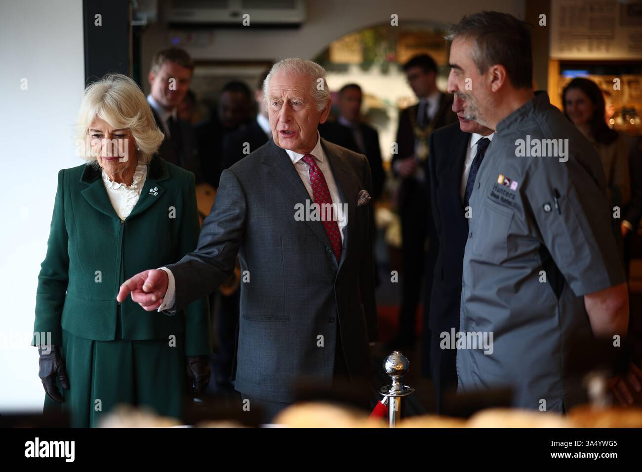 King Charles III and Queen Camilla are given a tour of Hunters Bakery ...