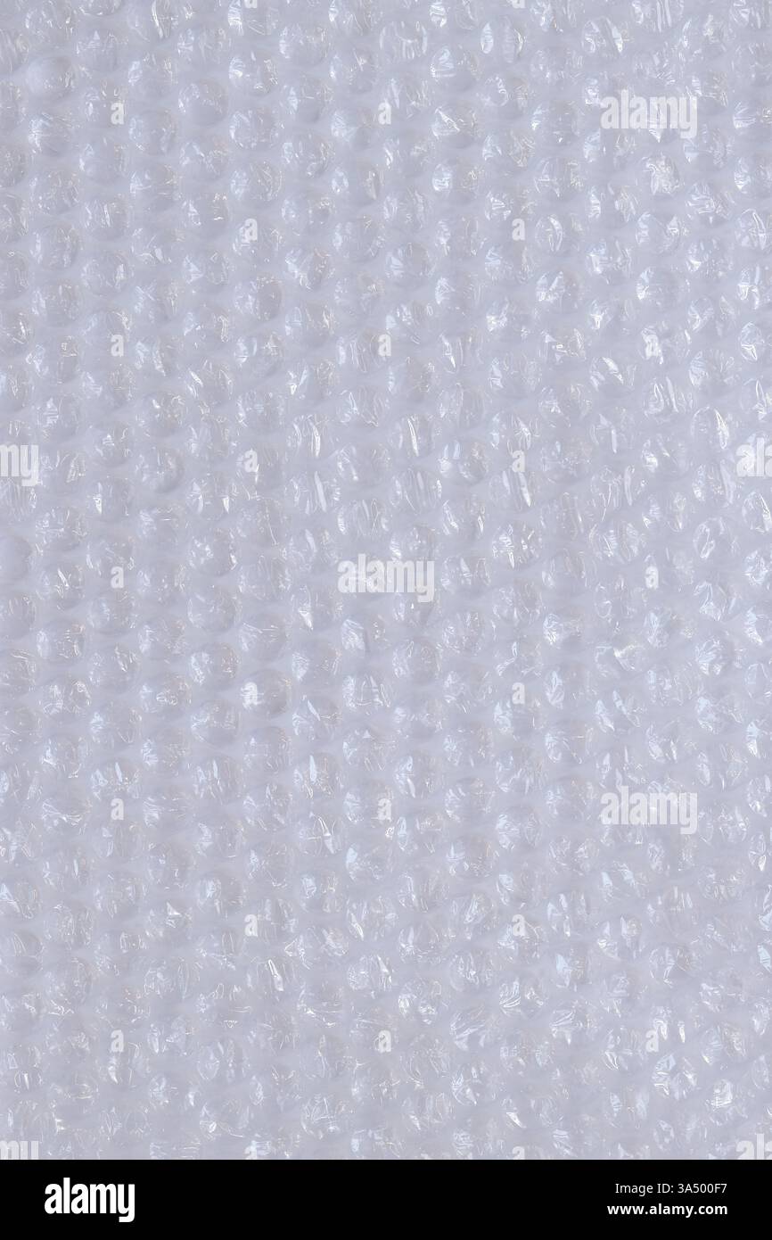 Air bubble wrap, top view. Transparent bubble wrap on light background ...