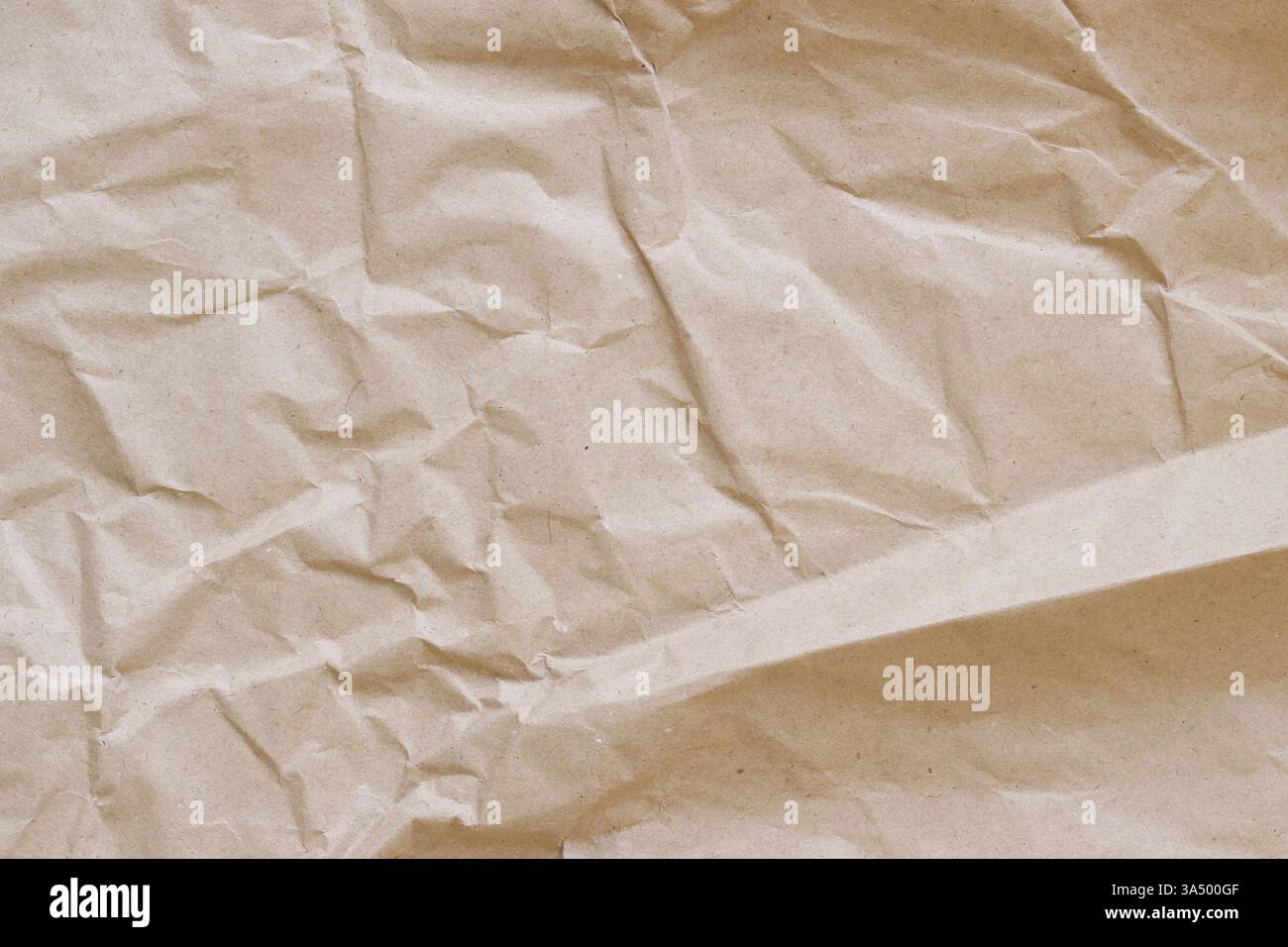 Crumpled craft paper background. Crumpled craft paper texture or paper ...