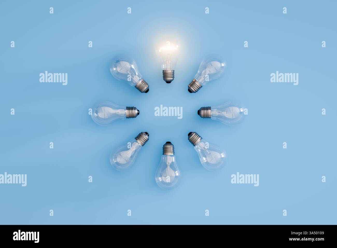 A group of light bulbs arranged in a circle on a blue background with ...