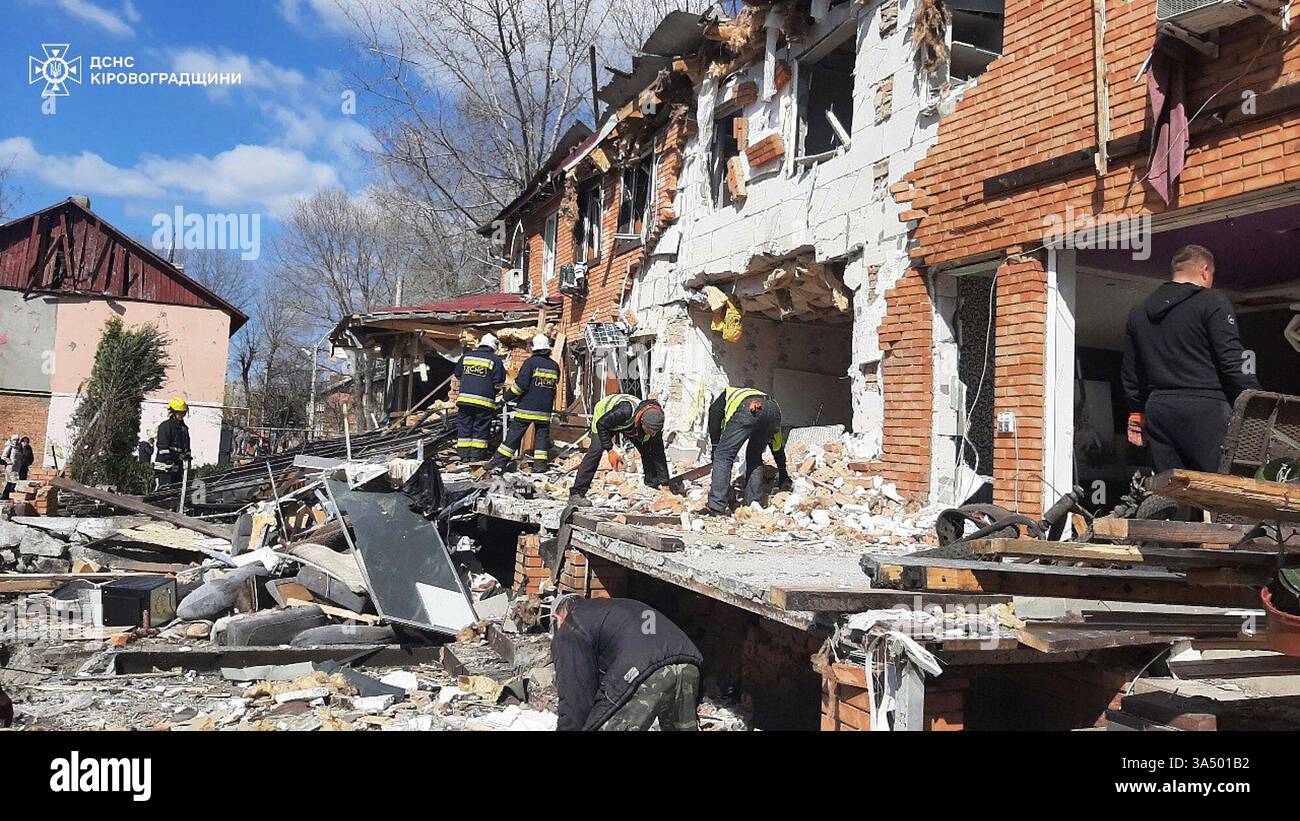 In this photo provided by the Ukrainian Emergency Service, searchers ...