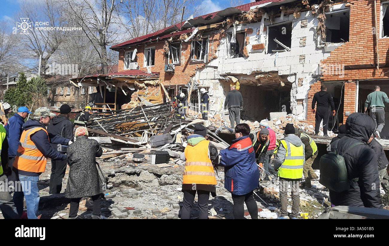 In this photo provided by the Ukrainian Emergency Service, residents ...