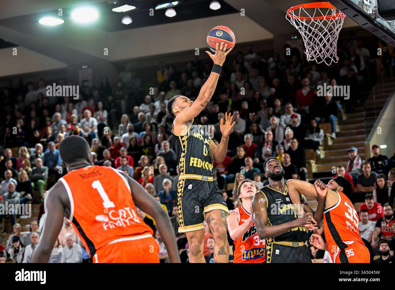 #0 Elie Okobo, #14 Mam Jaiteh of Monaco and #1 Abdoulaye Ndoye, 34 ...