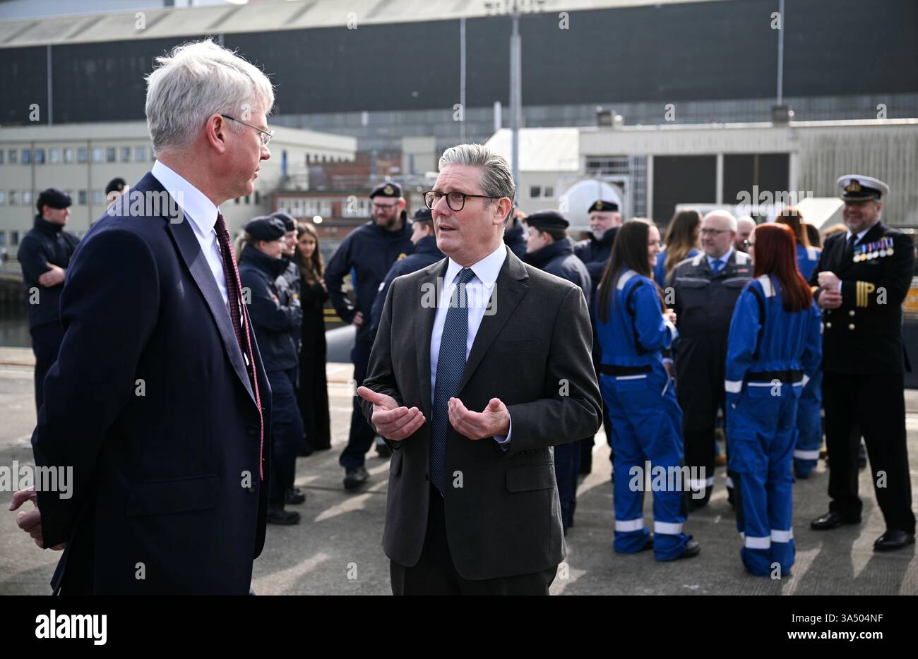 Prime Minister Sir Keir Starmer speaks with CEO of BAE Systems Charles Woodburn (left) after ...