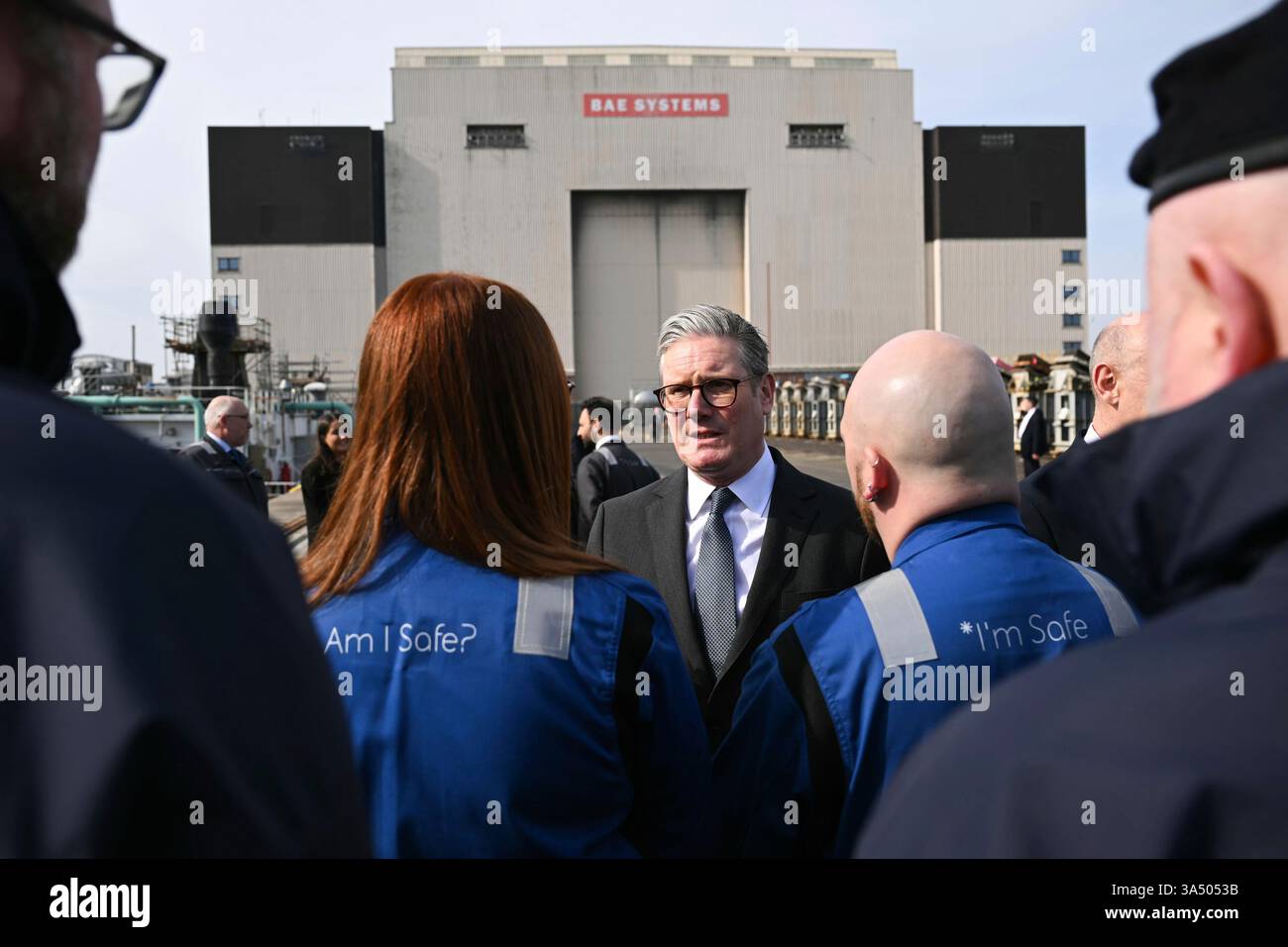 Britain's Prime Minister Keir Starmer, center, speaks to Royal Navy ...