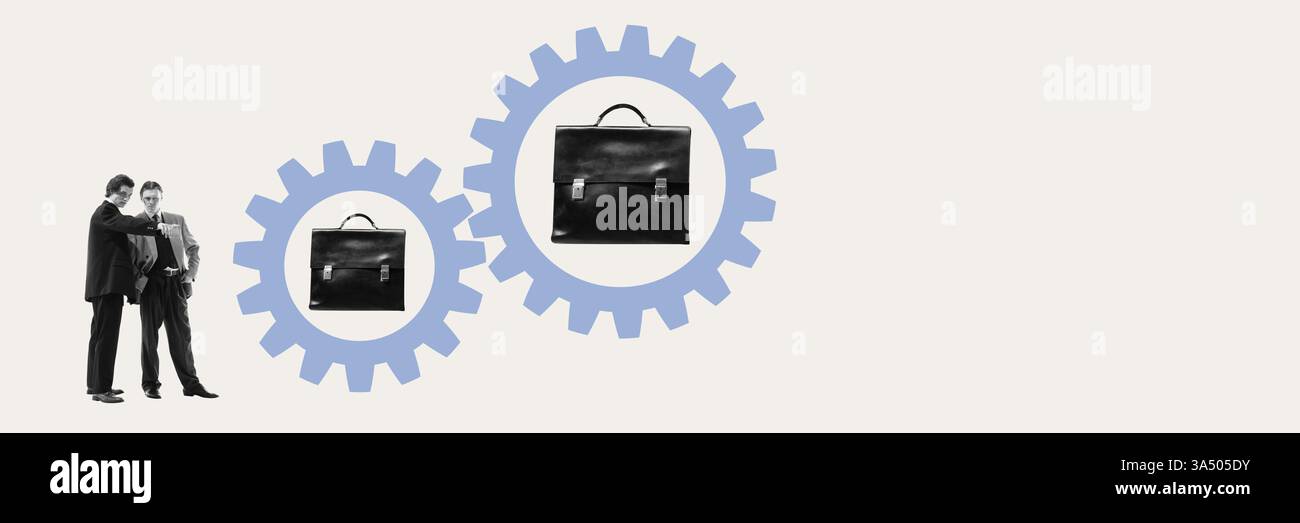 Enterprise system. Two businessmen examining workflow inside mechanical ...