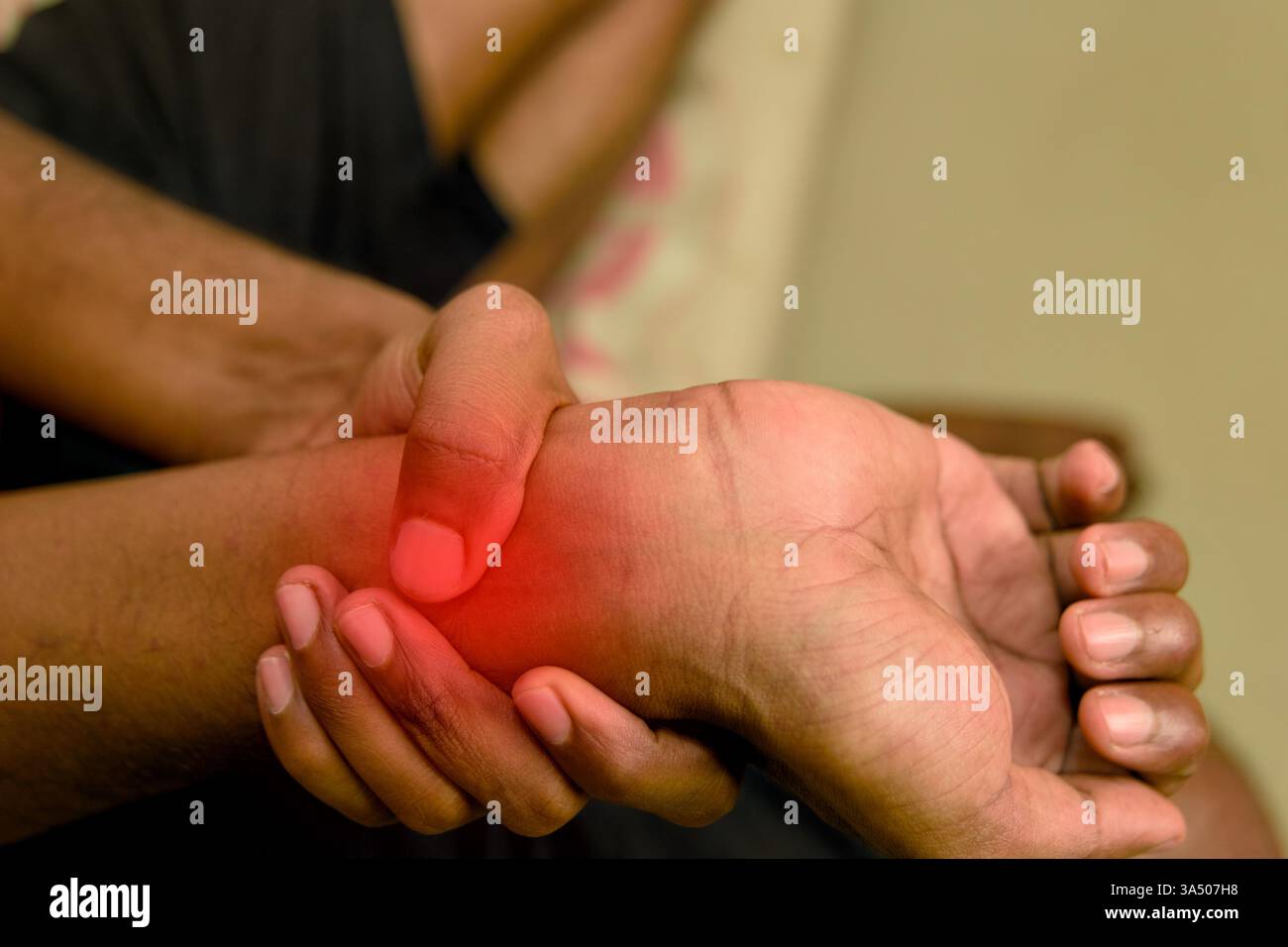 Hands demonstrate a wrist massage technique to alleviate discomfort and ...
