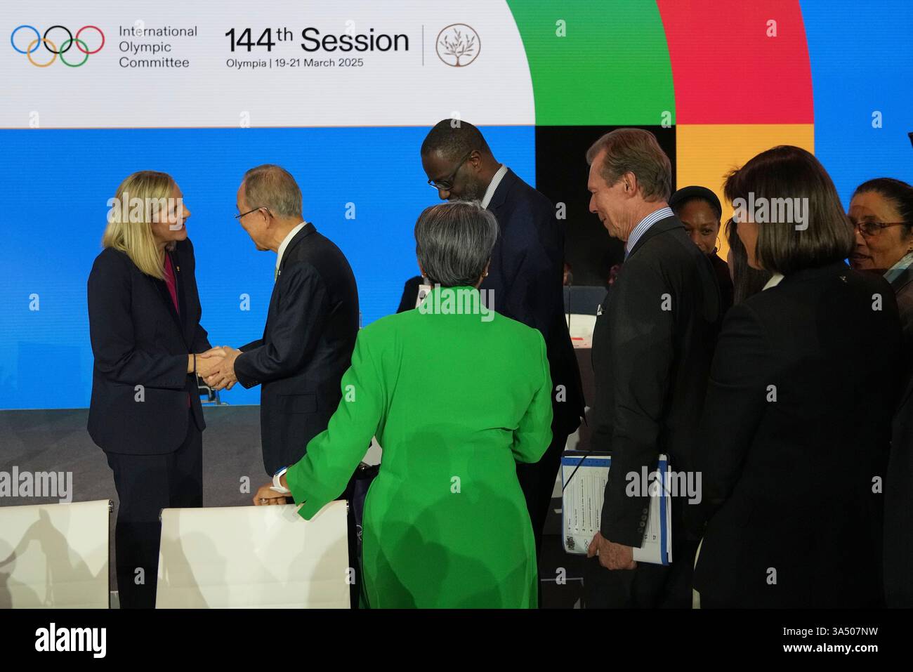 Kirsty Coventry, left, is congratultated after she was announced as the new IOC President at the ...