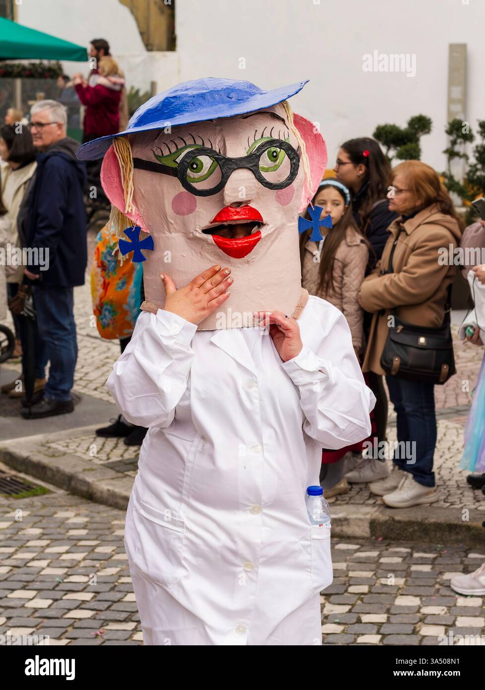 Big Head costumes at Carnival in Tomar, Portugal 2025 Stock Photo - Alamy