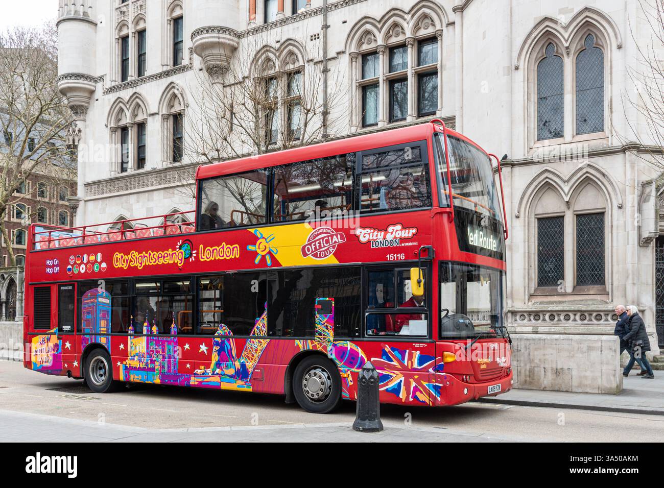 Red city sightseeing double decker bus on the Strand outside the Law ...