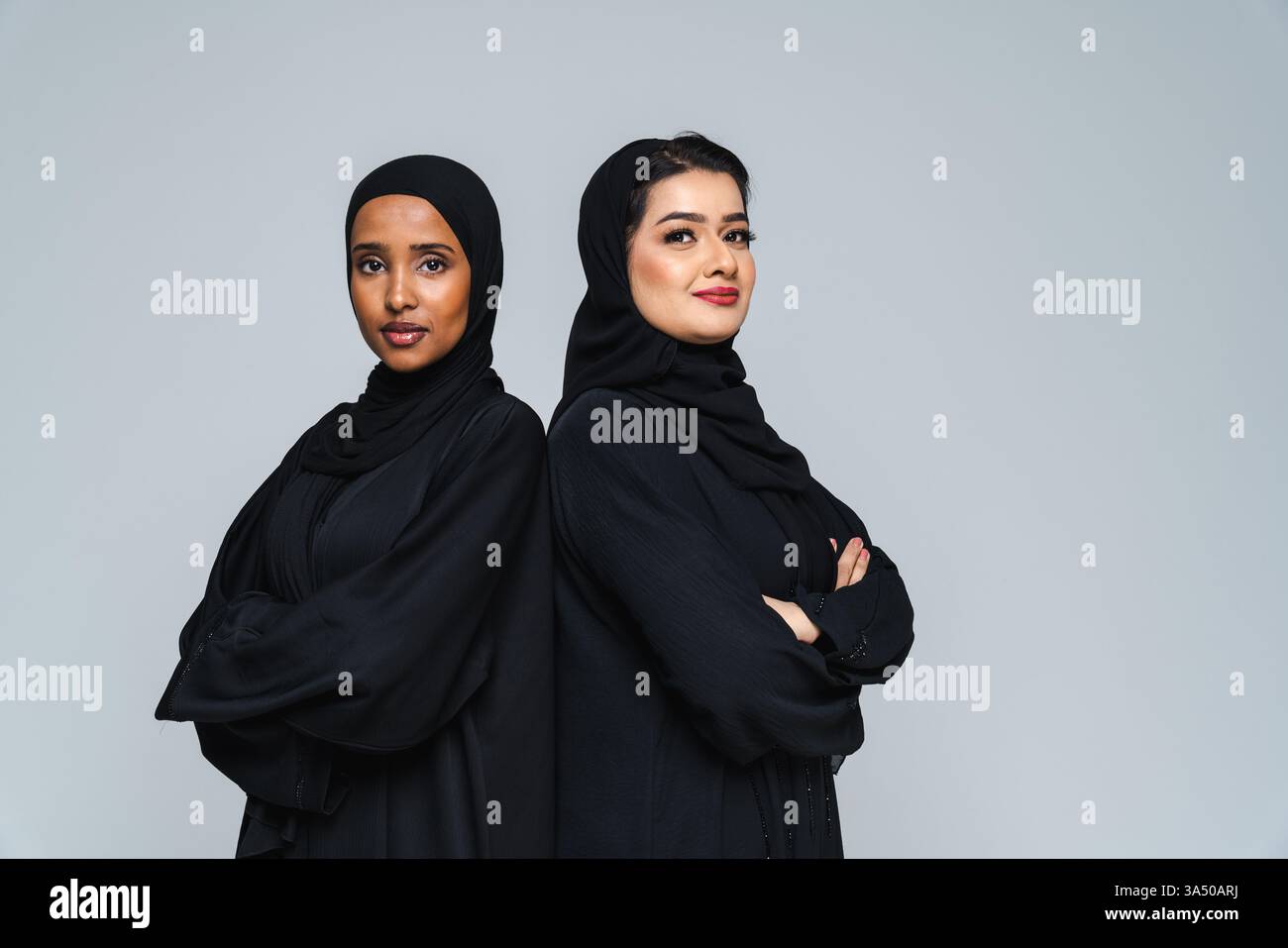 Beautiful arab middle-eastern women with traditional abaya dress in ...