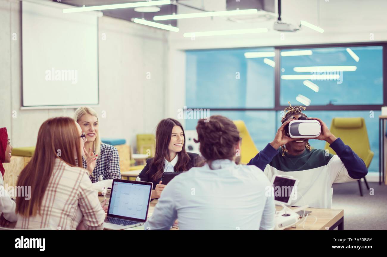 Black male developer with braids wearing VR headset and experiencing ...