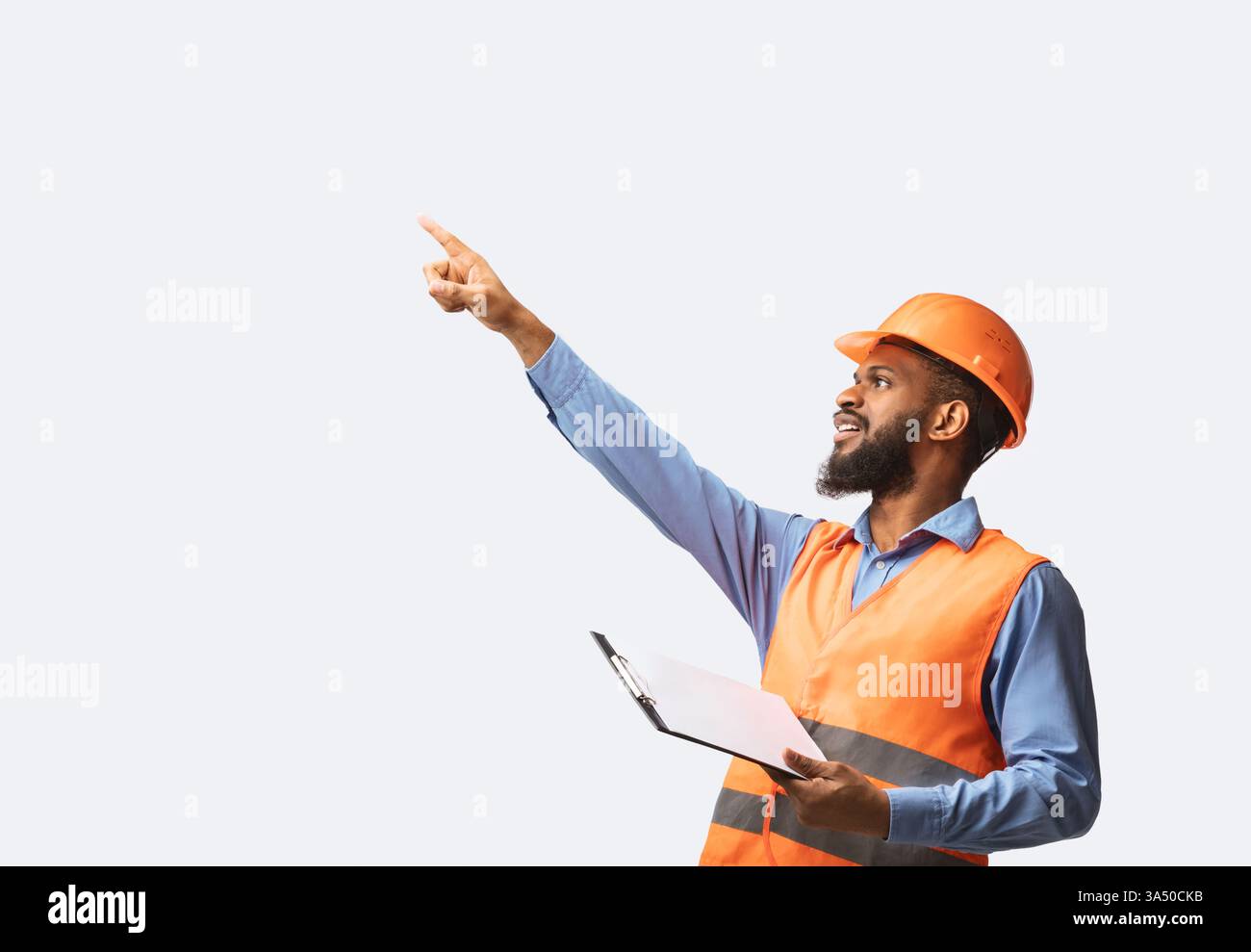 Black Architect Working On Construction Site Pointing Finger Holding ...