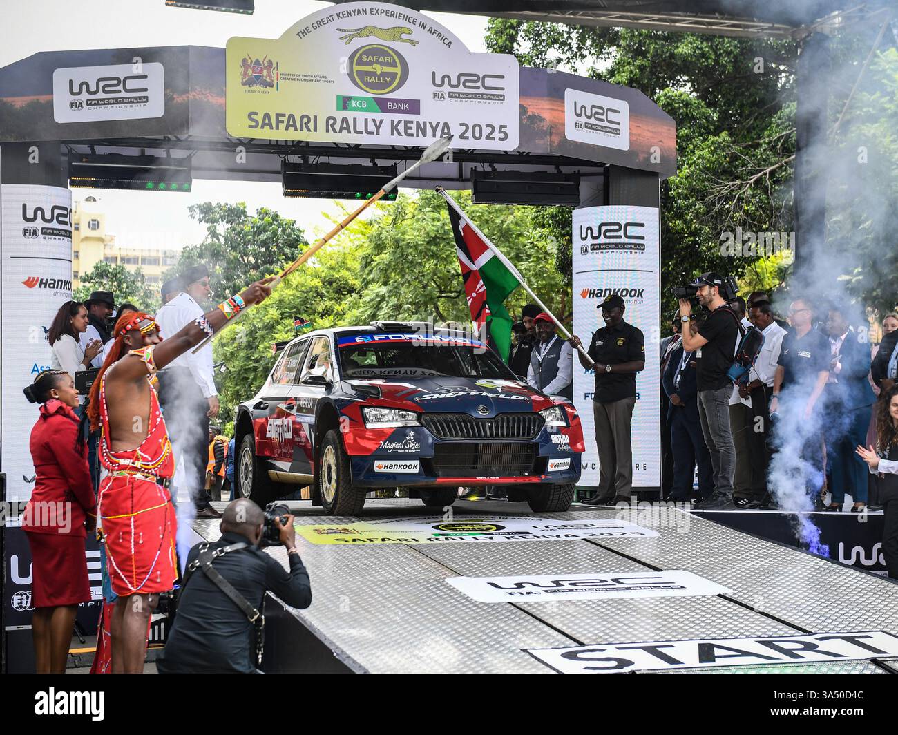 Nairobi. 20th Mar, 2025. The first competing vehicle sets off during ...