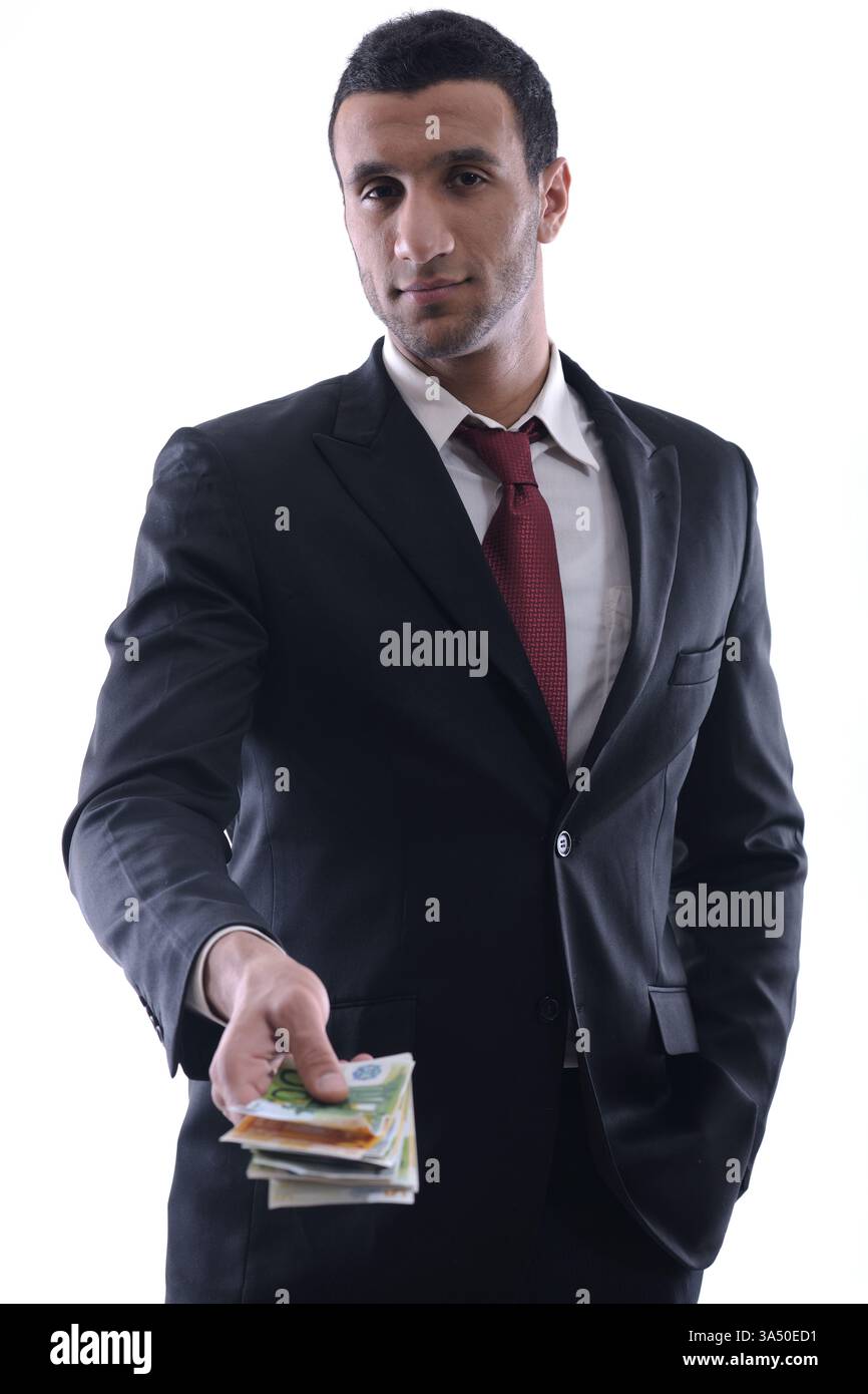 Portrait of a business man holding and catch falling money bills ...