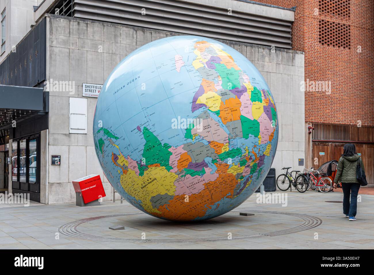 Globe art installation at LSE, The World Turned Upside Down by the ...