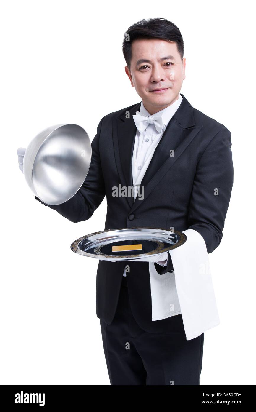Happy Chinese waiter showing credit card Stock Photo - Alamy