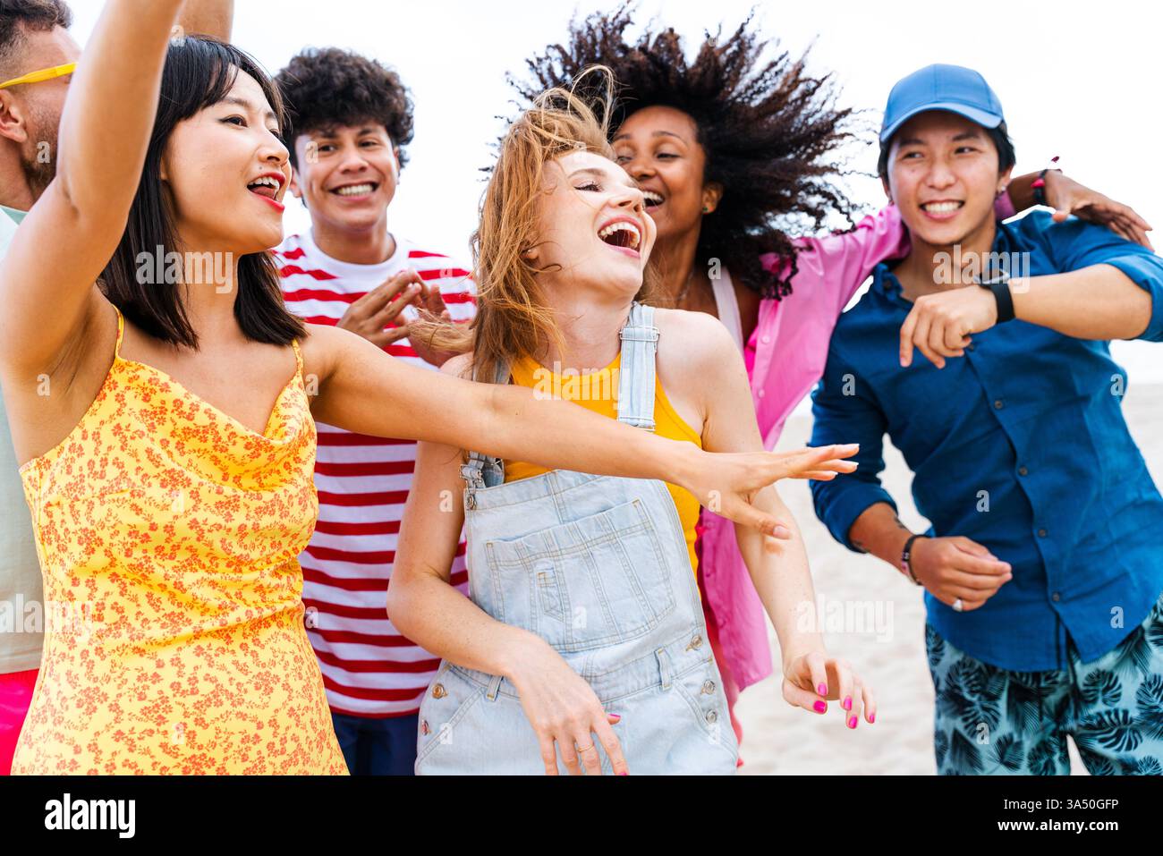 Group of young happy friends bonding outside, having fun on summertime ...