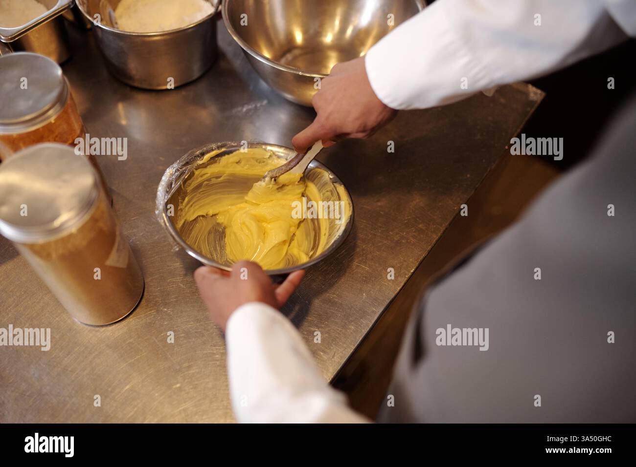 Chef beating butter hi-res stock photography and images - Alamy