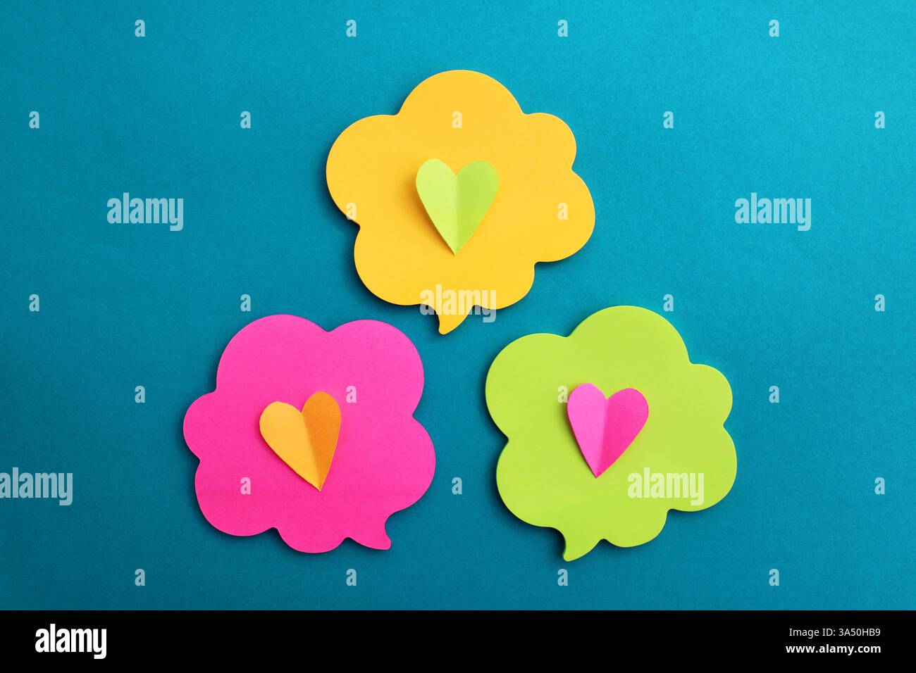 Speech bubbles expressing affection with a heart Stock Photo - Alamy
