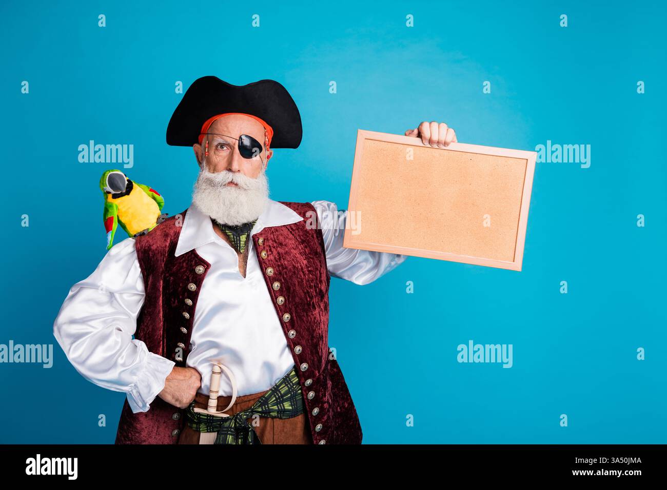 Photo portrait of bearded pirate man hold picture frame wear hallooween ...