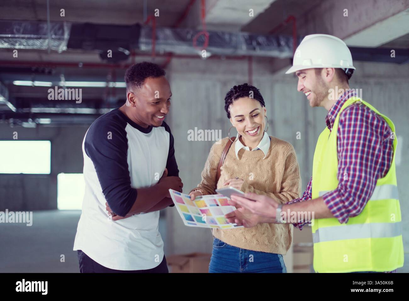 architect engineer using tablet computer while showing house design ...