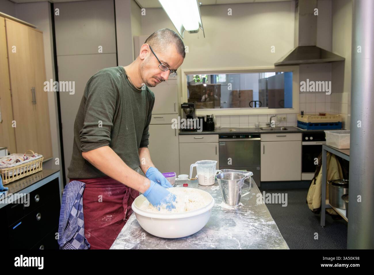 The Speltheld Baking his Bread. Craftsman and Bread Baker Dhinand, a.k ...