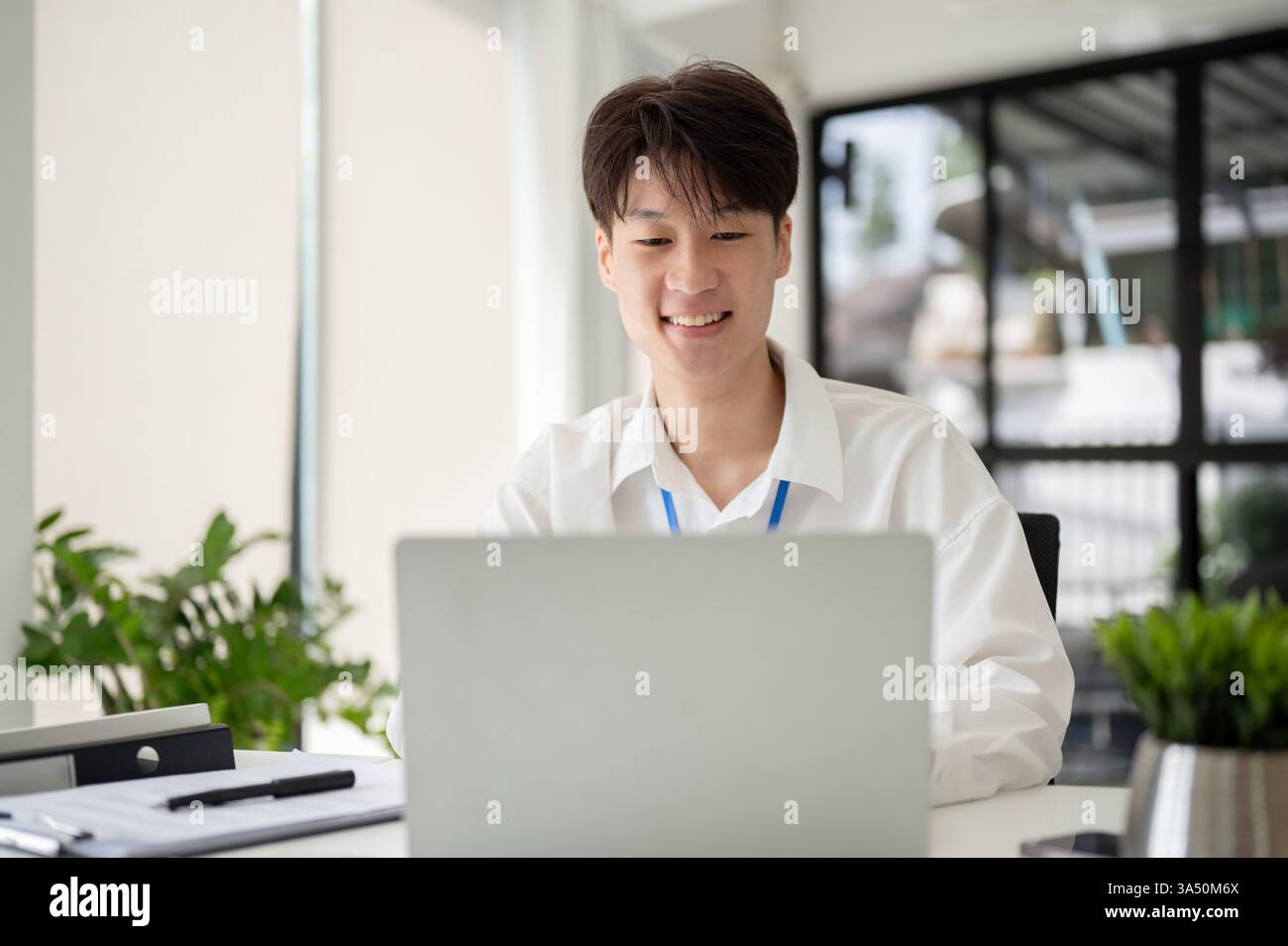 Portrait positive asian engineer sitting hi-res stock photography and ...