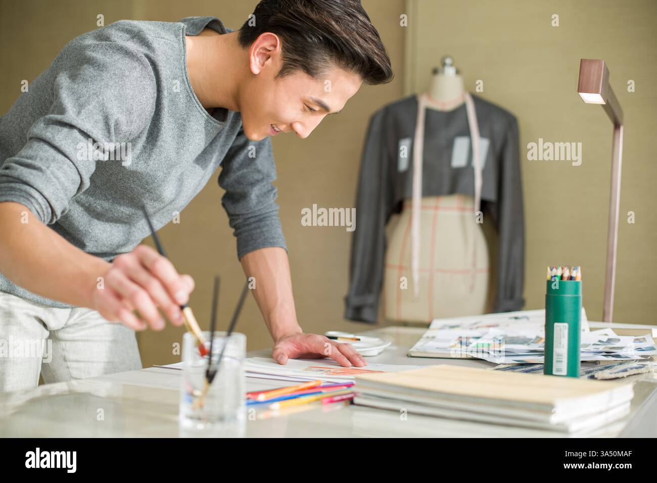 Male designer drawing model sketch hi-res stock photography and images - Alamy