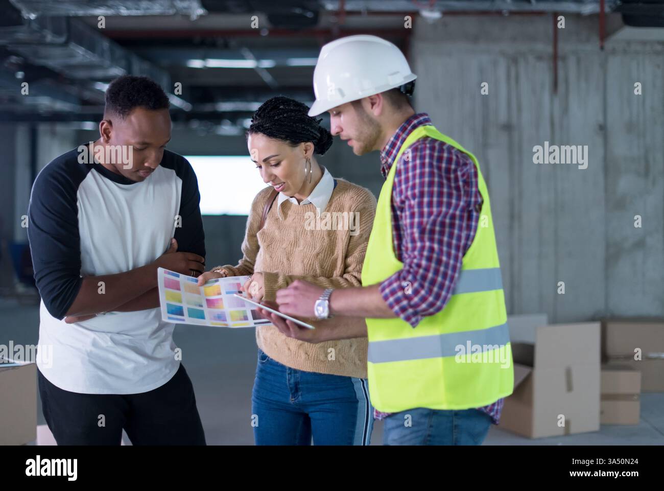 architect engineer using tablet computer while showing house design ...