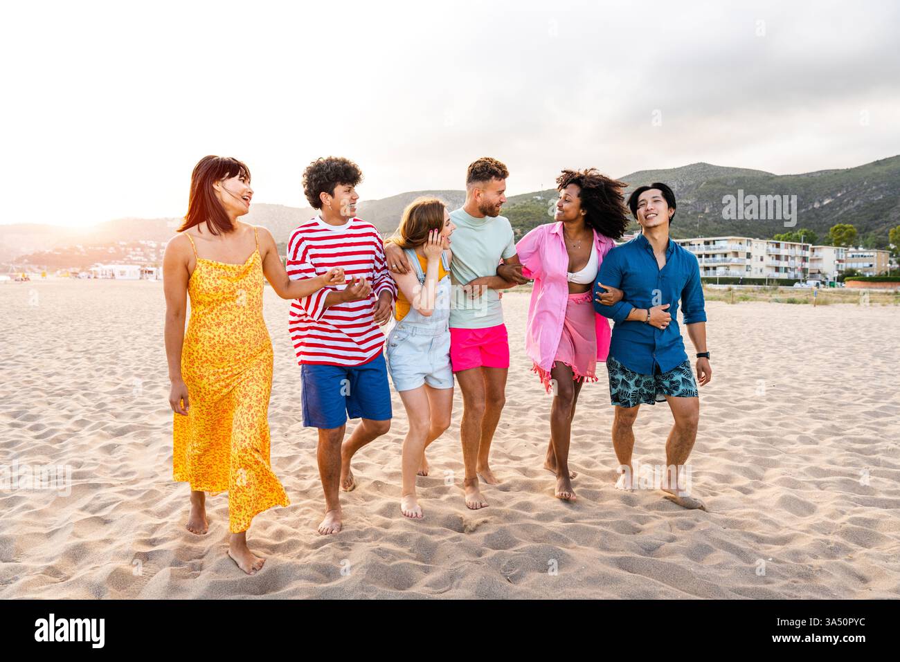 Group of young happy friends bonding outside, having fun on summertime ...
