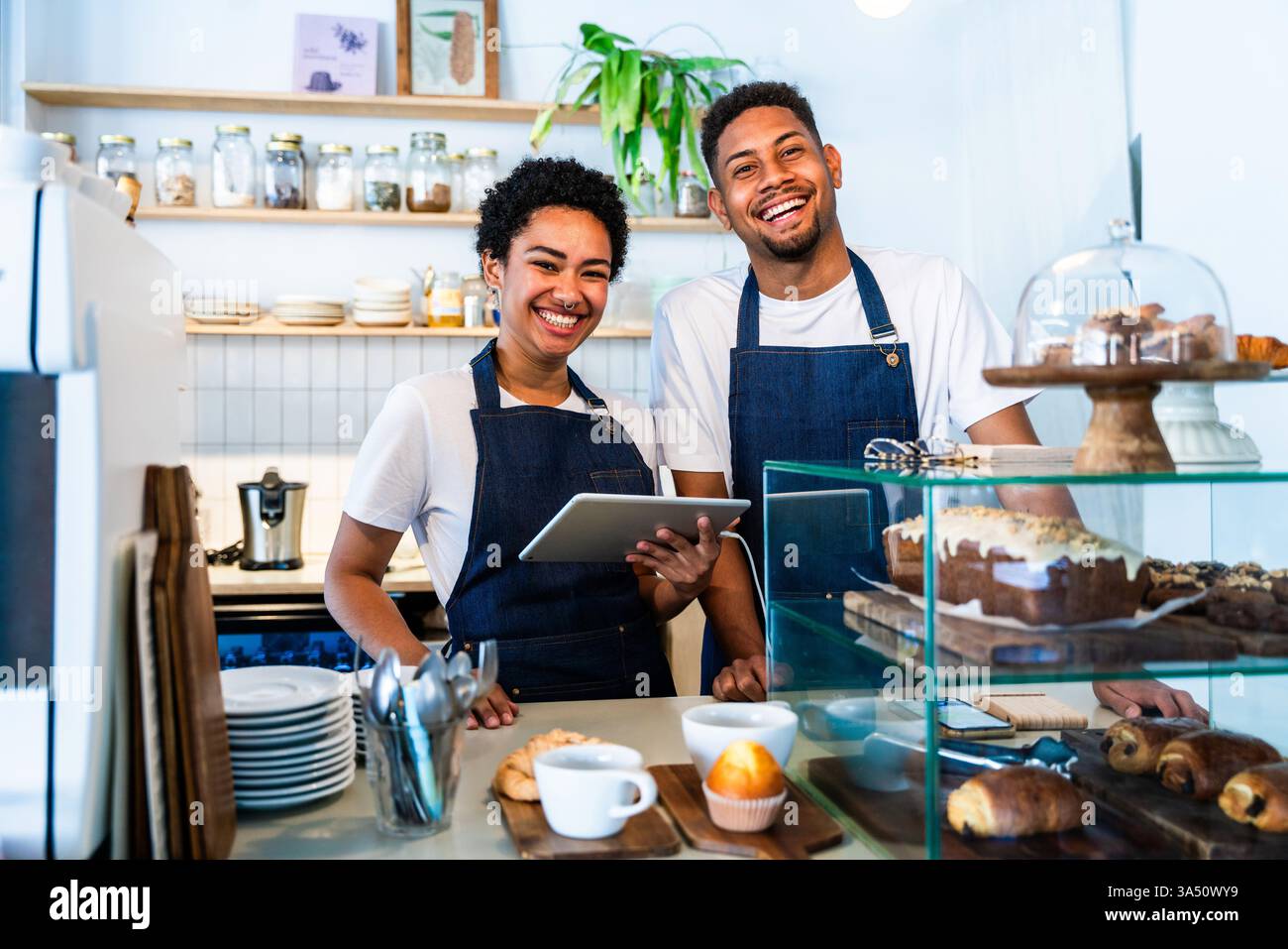 Diverse cafe staff ready hi-res stock photography and images - Alamy
