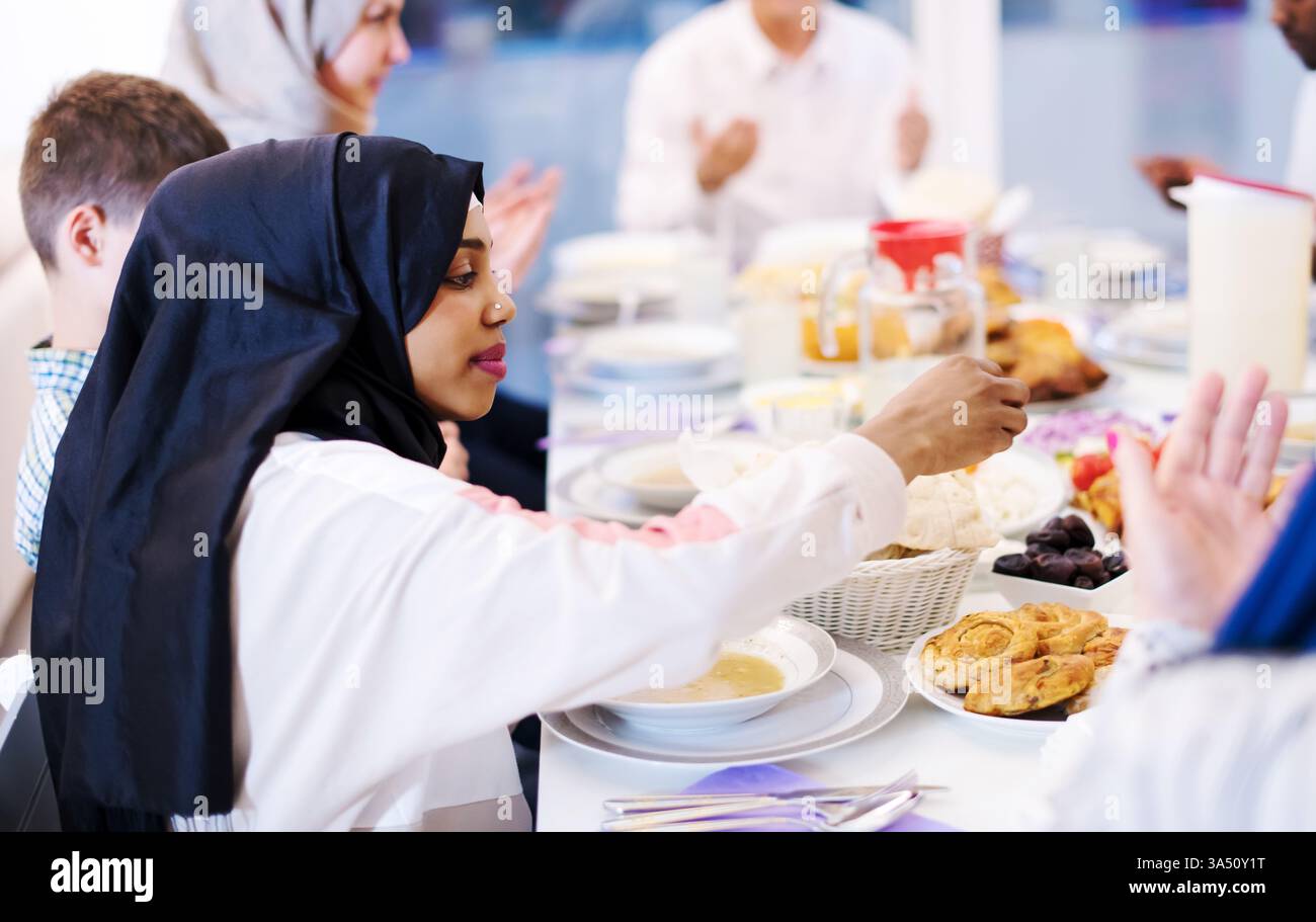 modern african american muslim woman enjoying iftar dinner together ...