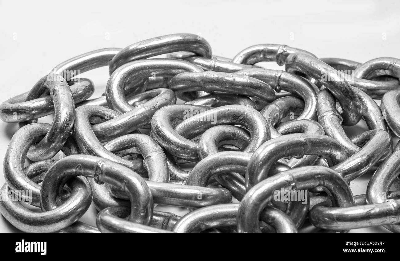 Interlinked steel chains with rugged texture in monochrome Stock Photo ...