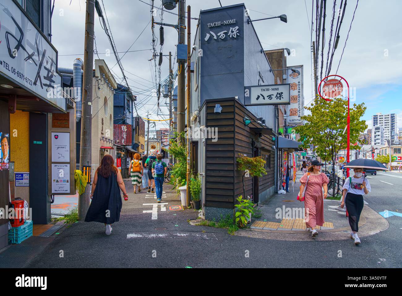 Osaka, Japan - Sep 23 2024, panoramic view of the fork of two streets ...