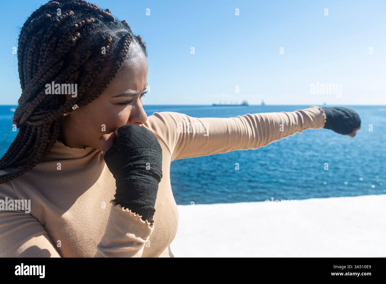 African American woman boxing outdoors Stock Photo - Alamy