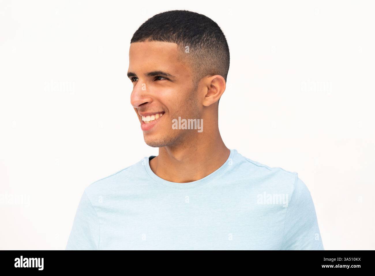 Close up horizontal portrait smiling young North African man and ...