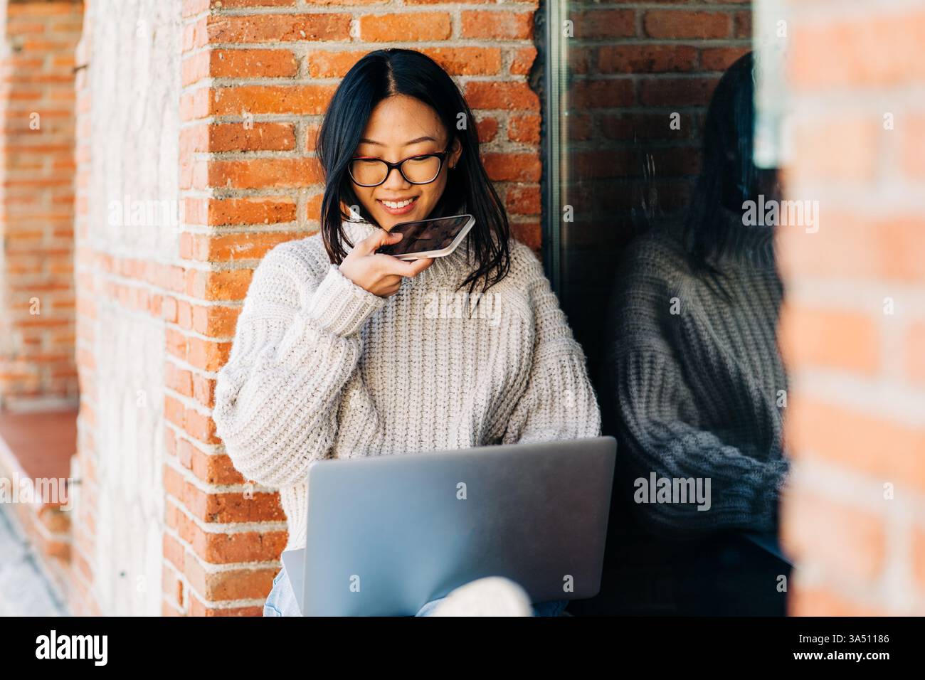 Millennial asian female voice hi-res stock photography and images - Alamy