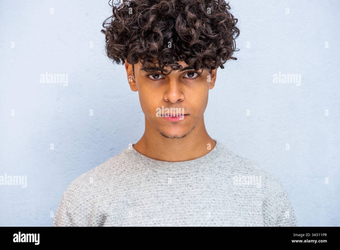 Close up horizontal portrait handsome young North African man against ...