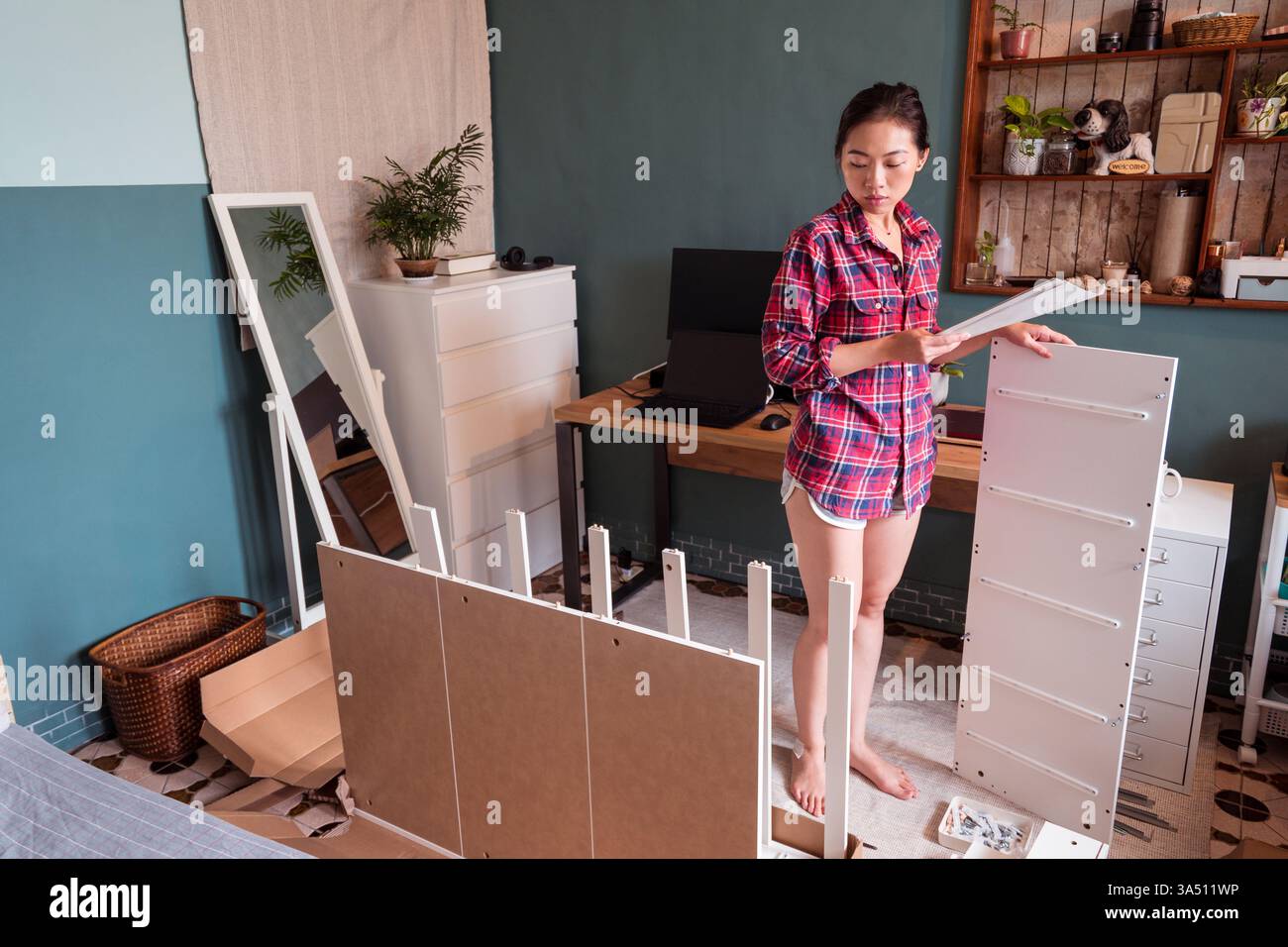 Busy assembling hi-res stock photography and images - Alamy