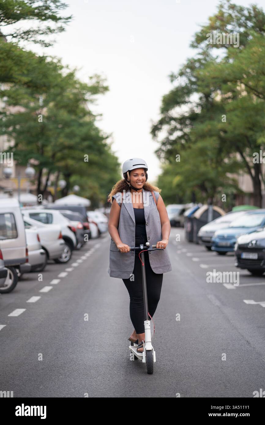 Full body of stylish happy overweight African American female in formal ...