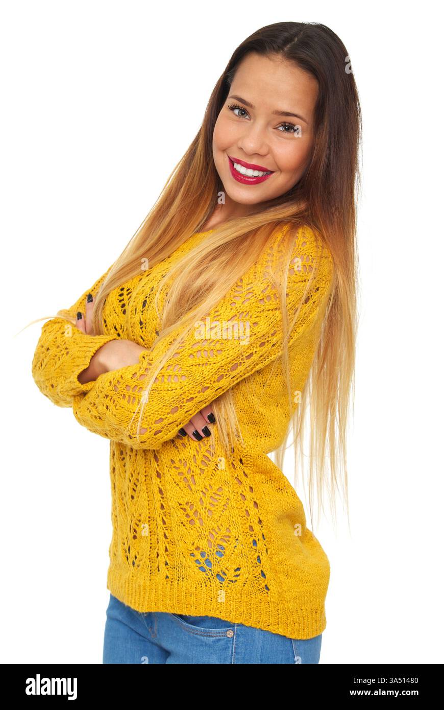Smiling Mixed race woman standing sideways with crossed arms against white background Stock ...
