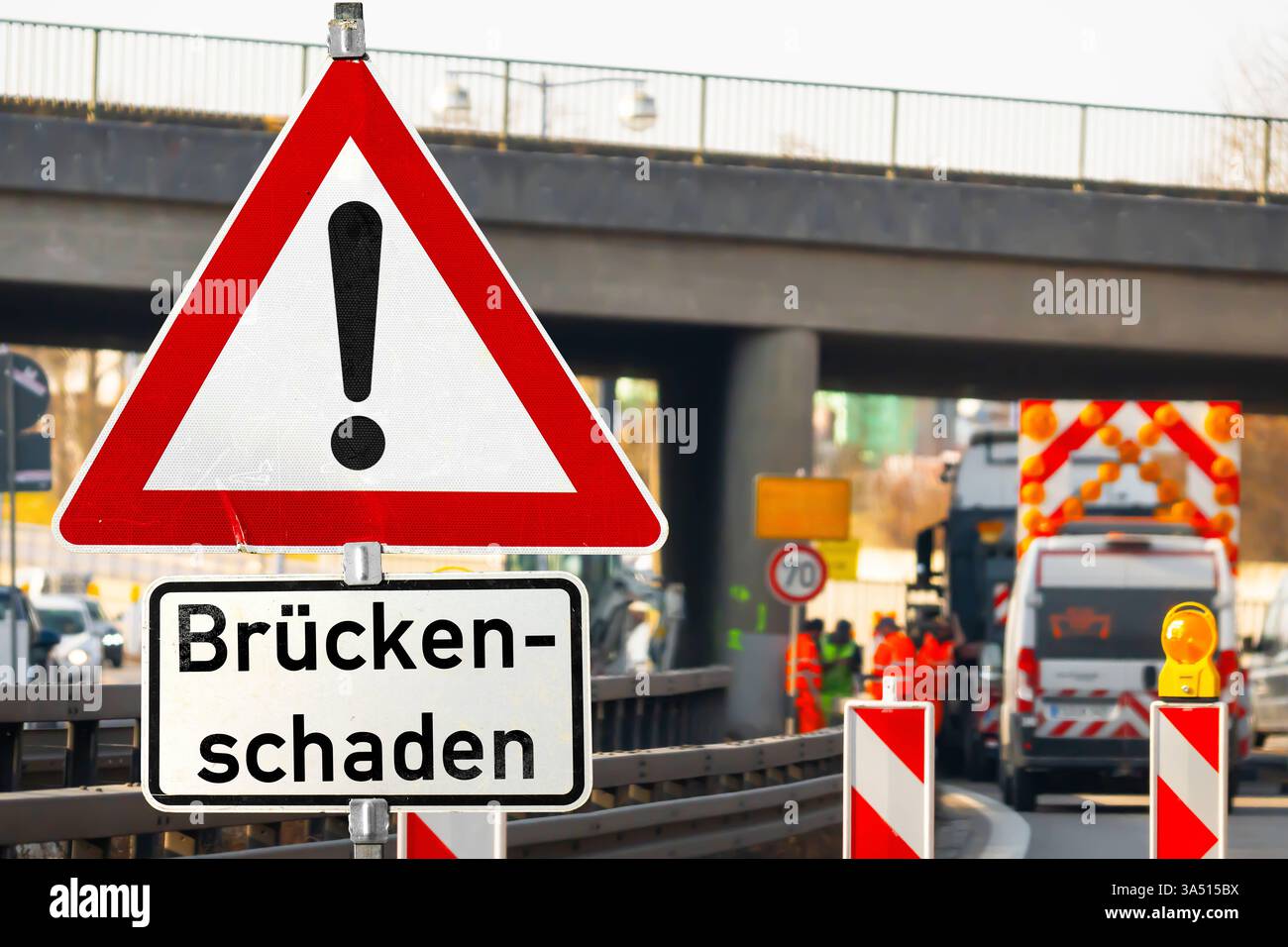 March 20, 2025: PHOTOMONTAGE, warning sign in front of a construction ...