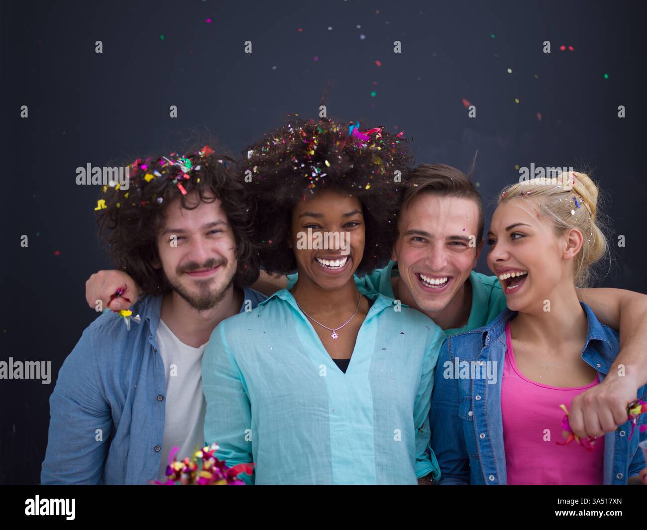 Cheerful Black woman with Afro among a diverse group of friends as ...