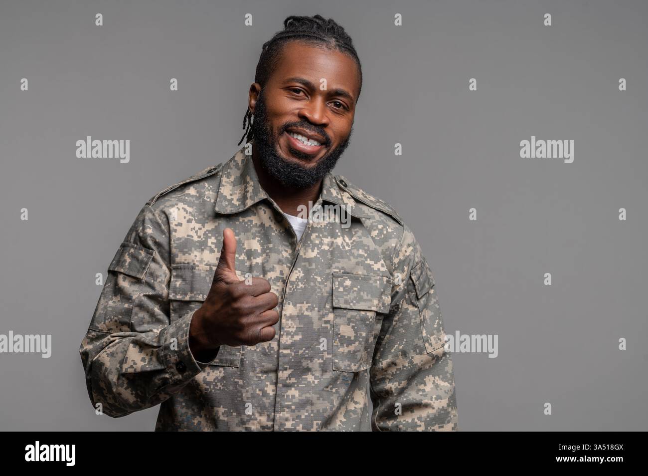 Military serviceman showing thumbs up hi-res stock photography and ...