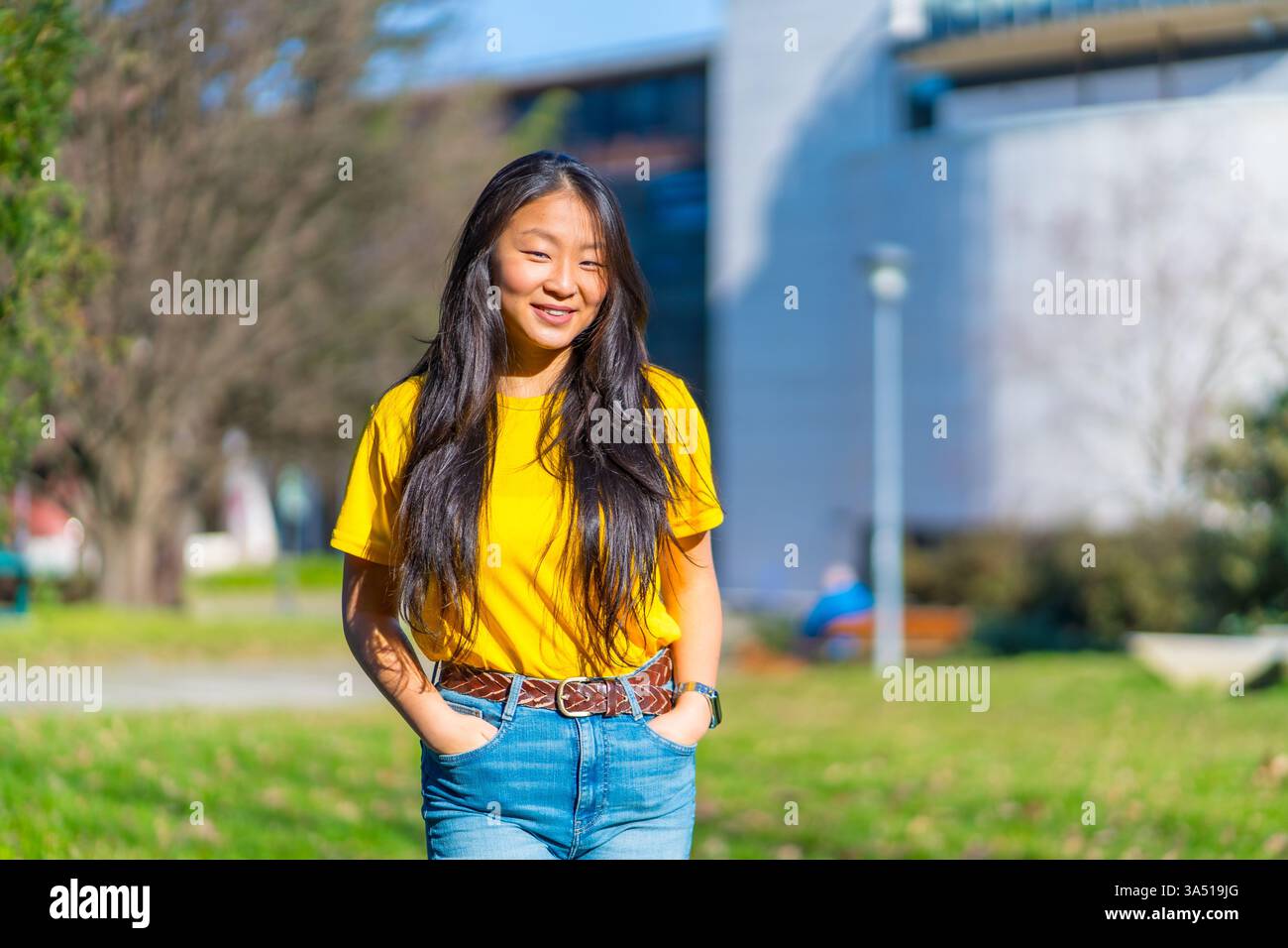 Female asian college student stands hi-res stock photography and images ...